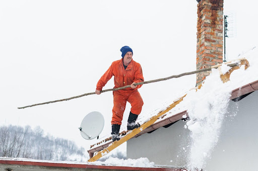 A Homeowner's Guide to Snow Removal From Roofs